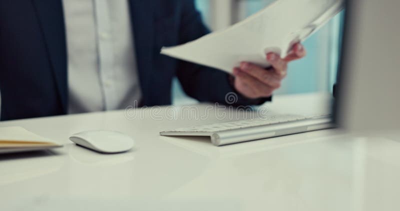 Hands, Documents and a Business Man Typing on a Keyboard while Marking ...