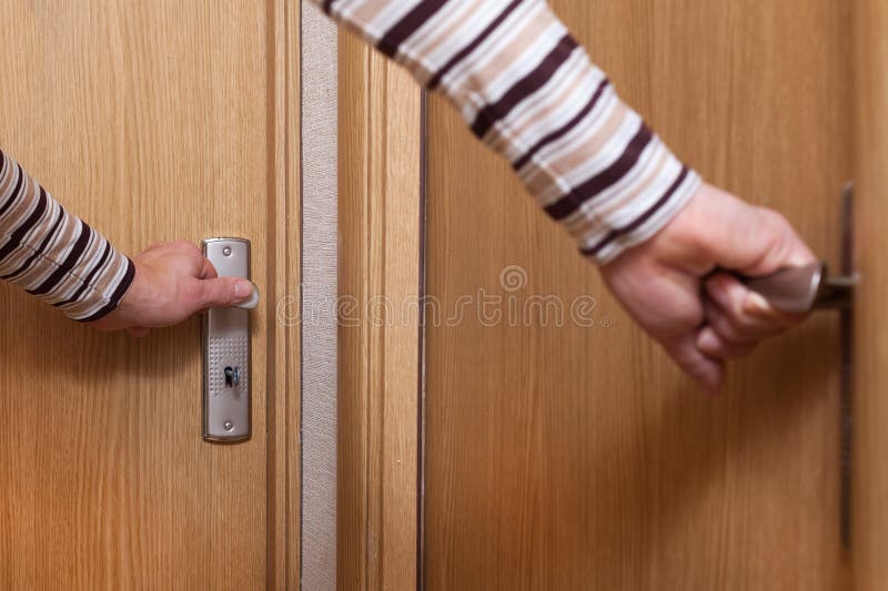 Hands and doors. stock image. Image of hand, wood, interior - 28562115