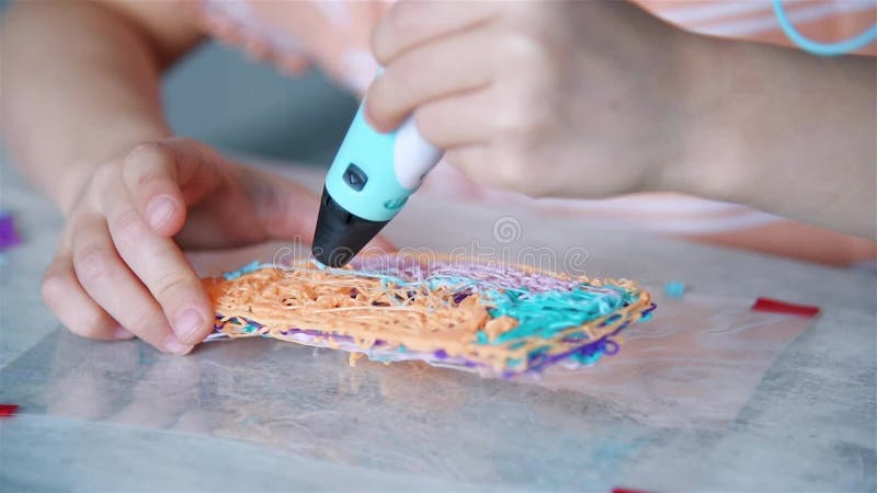 Hands Drawing with Stylish 3D Pen on Table. Stock Video - Video of ...