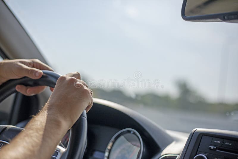 Hands of the Driver Driving a Car in the Road, Horizontal Stock Photo ...