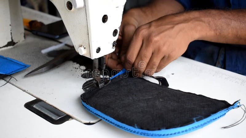 Hands Edging Padding of a Backpack Bag with a Sewing Machine, Close Up ...