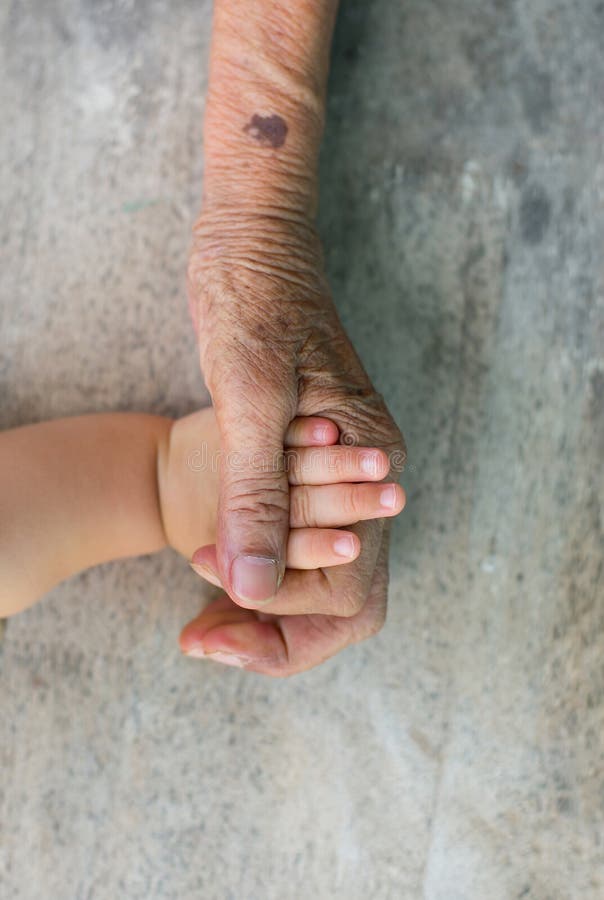Hand Elderly with Hand Children Touch Stock Image - Image of ...