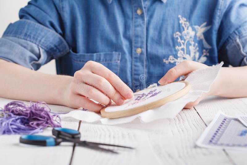 Hands Embroidering a Flower. Cross-Stitch Stock Image - Image of ...