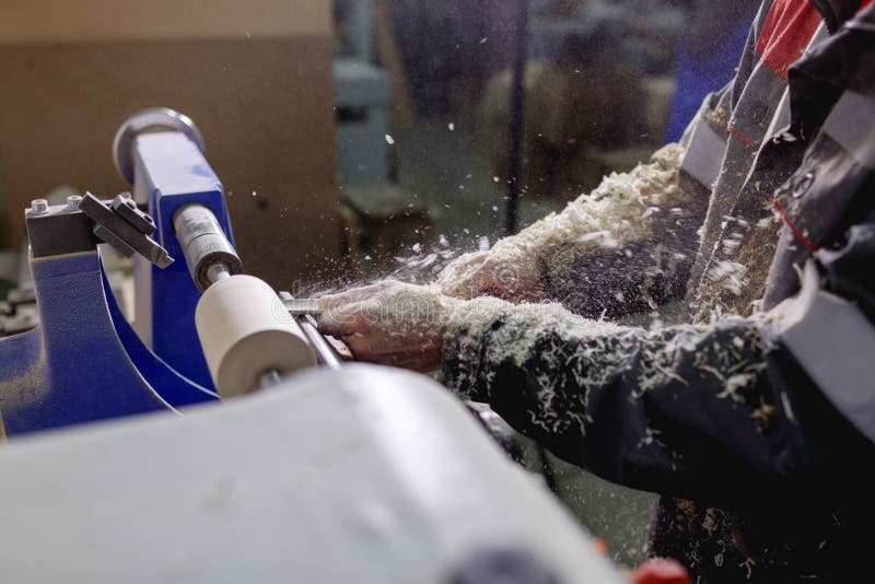 Hands of the Worker with the Tool Give a Round Shape To the Workpiece ...
