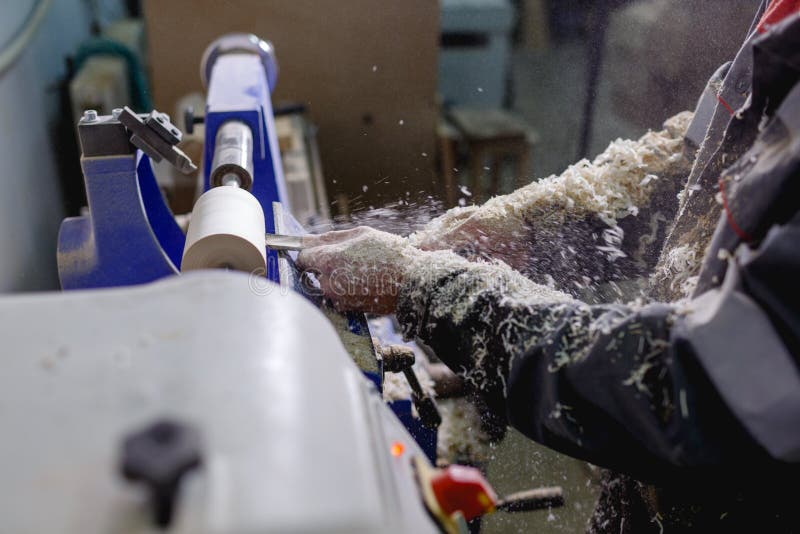 Hands of the Worker with the Tool Give a Round Shape To the Workpiece ...