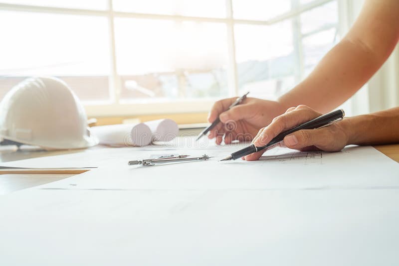 Hands of Engineer Working on Blueprint,Construction Concept. Eng Stock ...