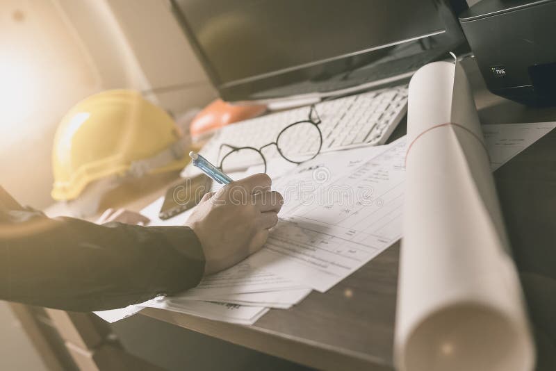 Hands of Engineer Working on Blueprint. Engineering Tools. Vintage Tone ...