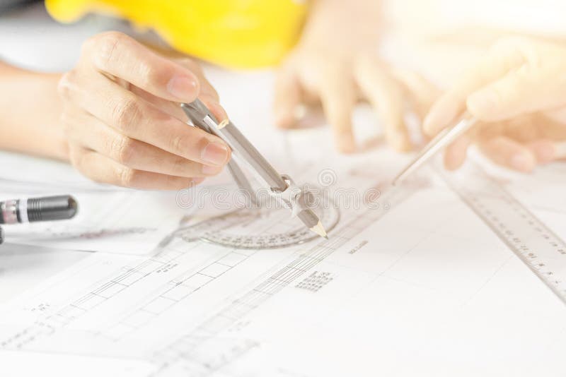 Hands of Engineer Working Design on Blueprint,Construction Concept ...