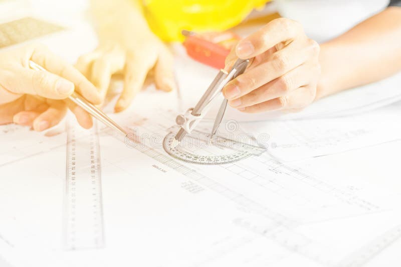 Hands of Engineer Working Design on Blueprint, Construction Concept ...