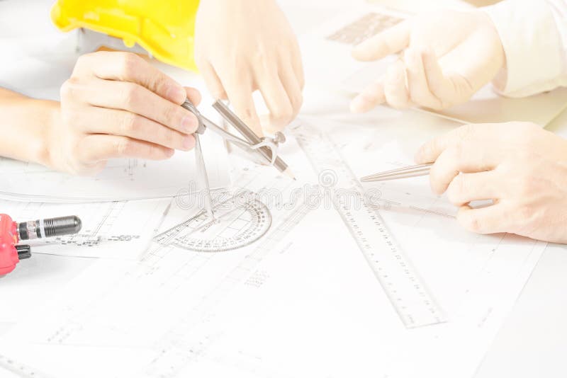 Hands of Engineer Working Design on Blueprint,Construction Concept ...
