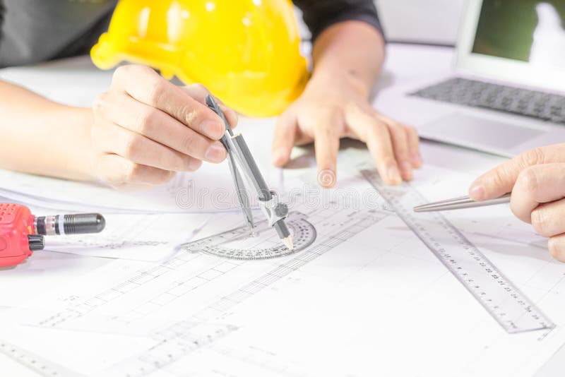 Hands of Engineer Working Design on Blueprint,Construction Concept ...