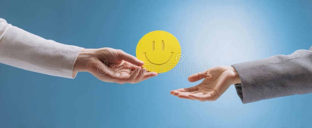 The Hands Exchanging a Cheerful Smiley Face Symbolizing Positivity and ...