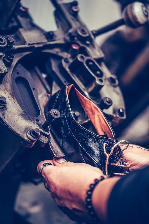 Hands of an Experienced Shoemaker Using Special Machine Tool for Making ...