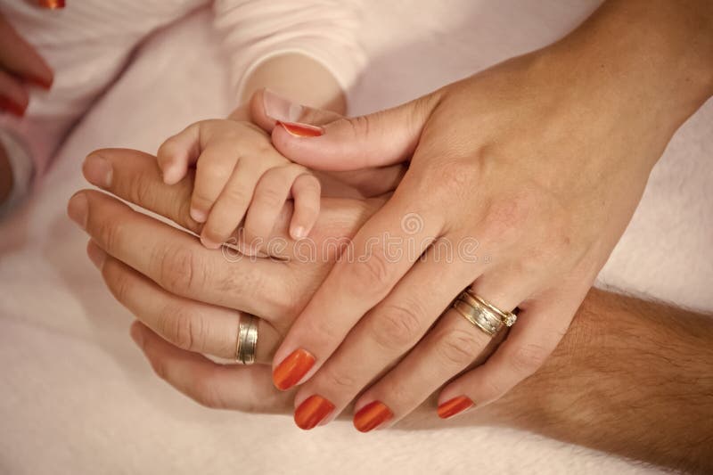 Hands of family together stock image. Image of childhood - 131548749
