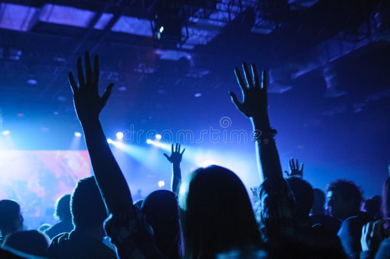 Hands of Fans Raised Up, during a Concert Stock Photo - Image of ...
