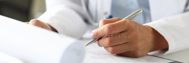 Hands of Female GP Making Notes with Silver Pen Stock Image - Image of ...