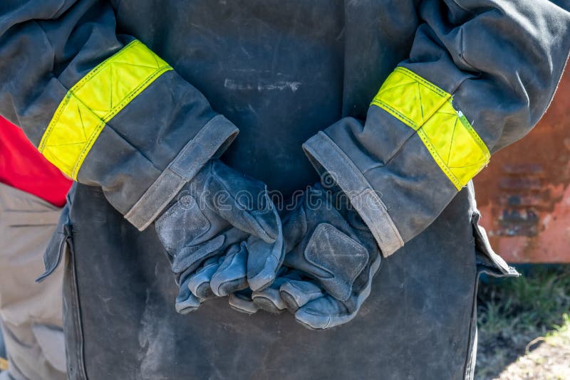 Hands of Firefighters with Gloves on Their Hands Stock Image - Image of ...