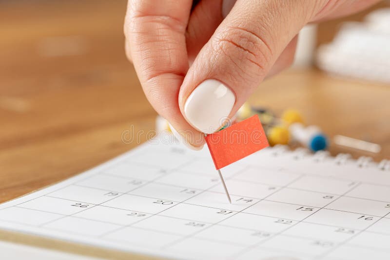 Hands Fixing Notes Schedule, Red Flag Pin Thumbnail in Calendar for ...