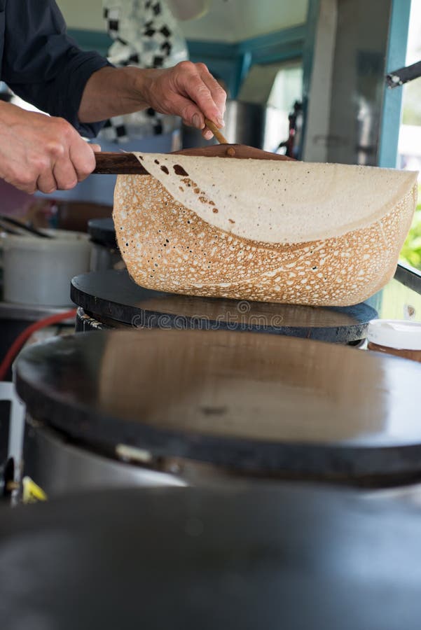 Hands Flipping Crepe with Wooden Tools Stock Image - Image of french ...