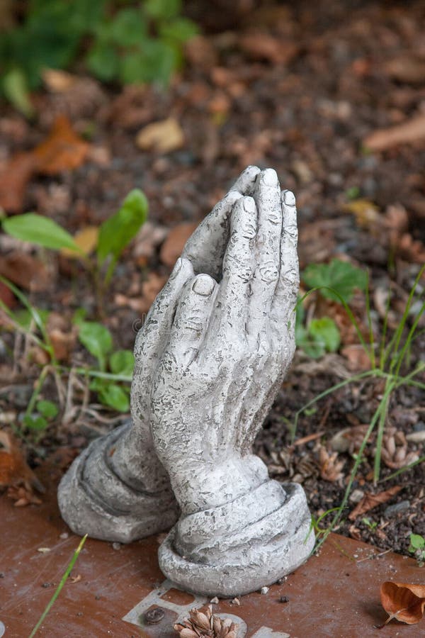 Hands folded in prayer stock image. Image of folded, sidewalk - 46208575