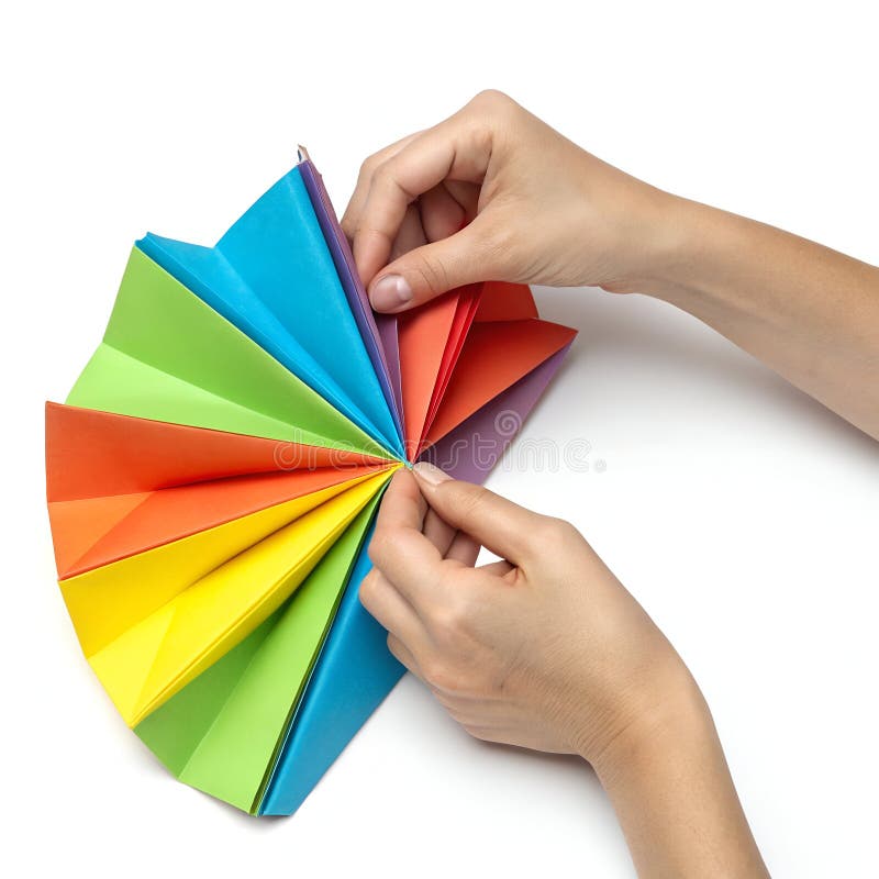 Hands Folding Colorful Paper Isolated on White Background Stock ...