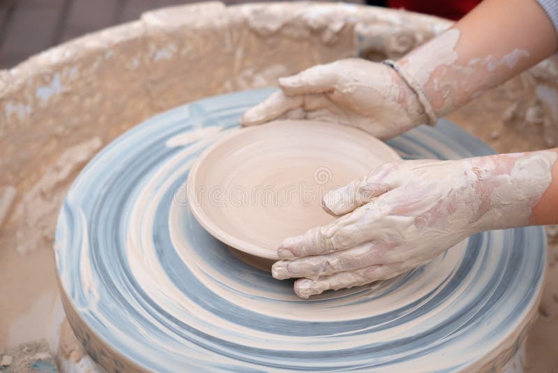 Hands Forming Clay on the Pottery Wheel Stock Photo - Image of potter ...