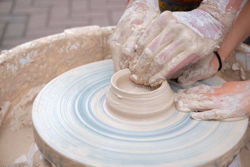Hands Forming Clay on the Pottery Wheel Stock Photo - Image of working ...