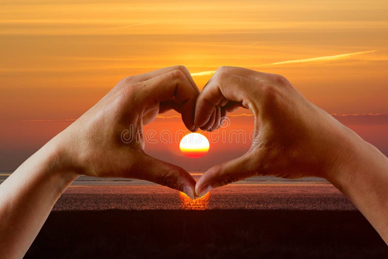 Hands Forming a Heart with Rising Sun Stock Image - Image of human ...