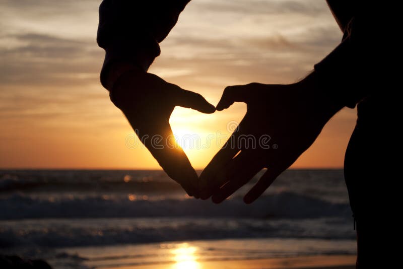 Hands Forming a Heart at the Sunset Stock Image - Image of love ...