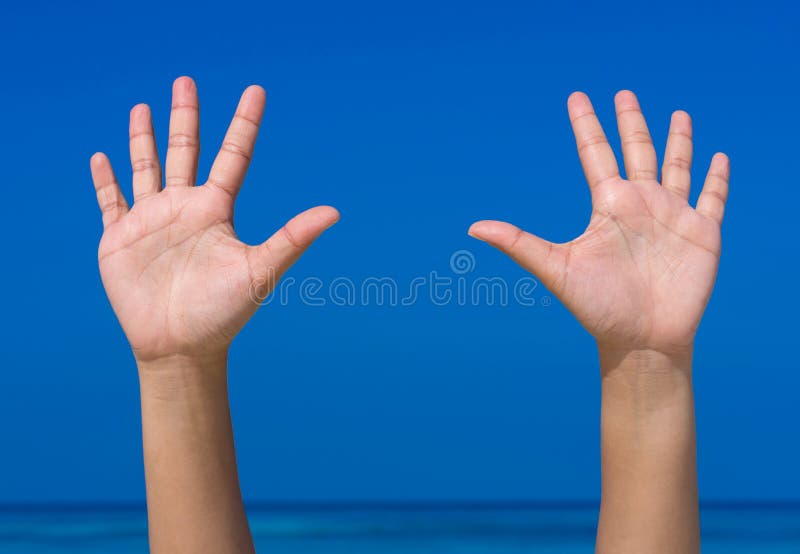 Hands Forming Raise/agree with Blue Sea and Sky Stock Photo - Image of ...