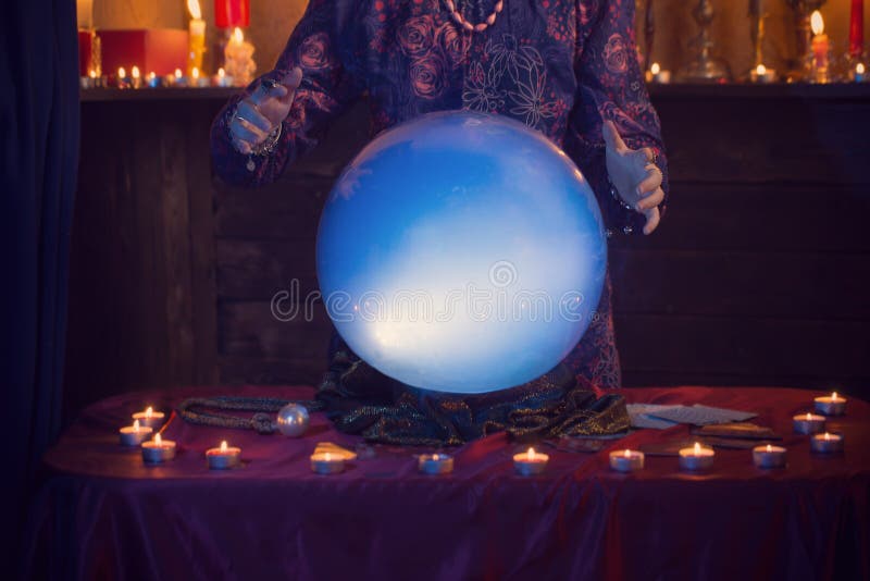 Hands of Fortune Teller with Illuminated Crystal Ball Stock Image ...