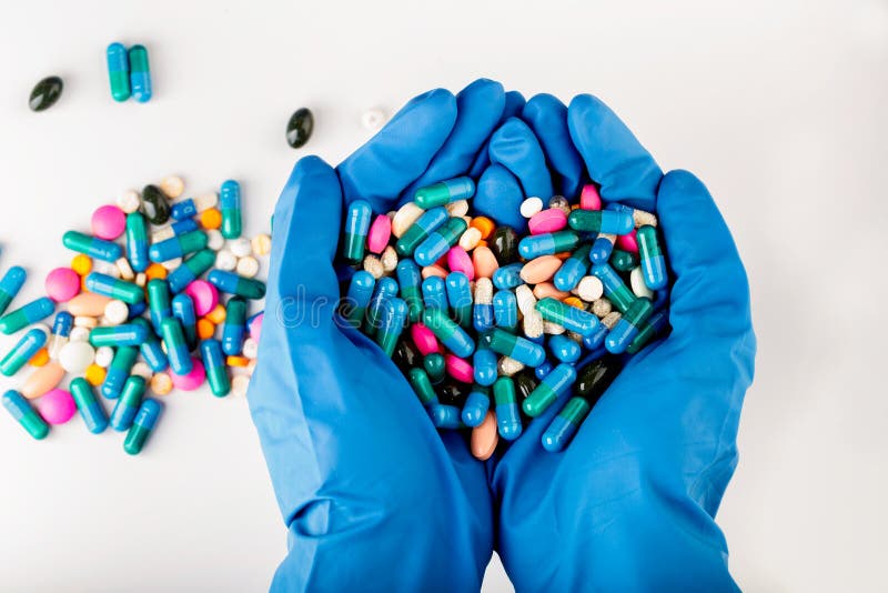 Hands Full of Medication. Tablets and Pils Stock Photo - Image of ...