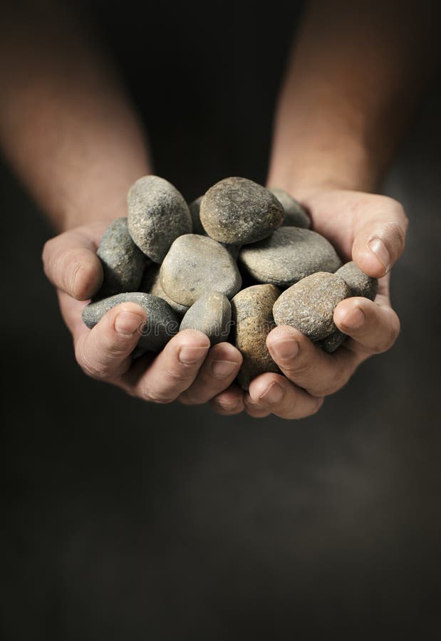 Hands full of rocks stock photo. Image of rock, holding - 24916004