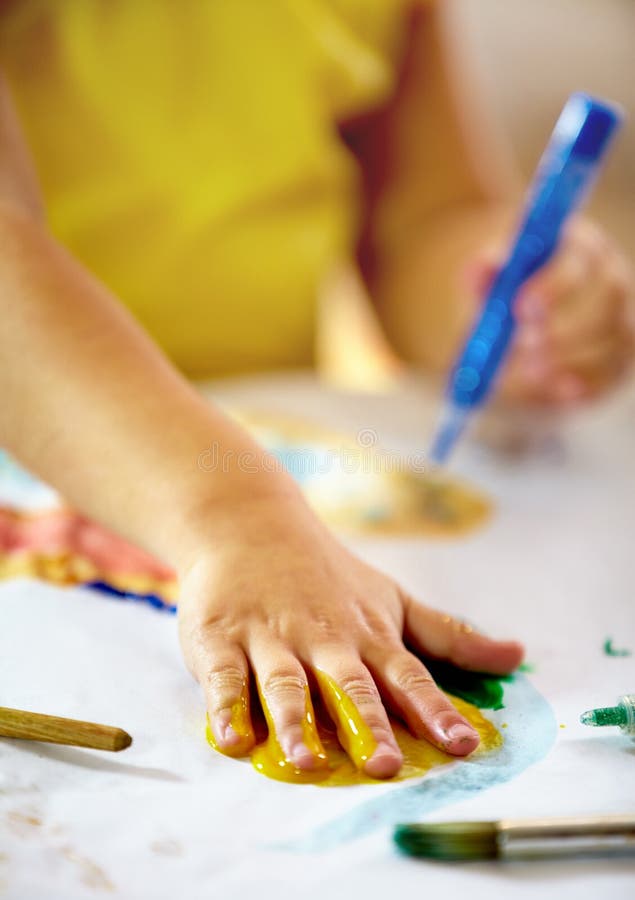 Hands on Fun. Shot of a Young Child Painting. Stock Image - Image of ...