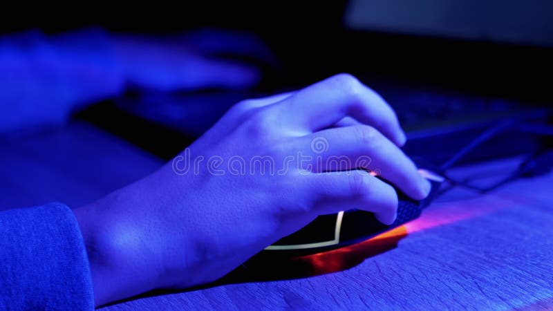 Hands of Gamer Playing Video Game at Computer in a Virtual Room at ...