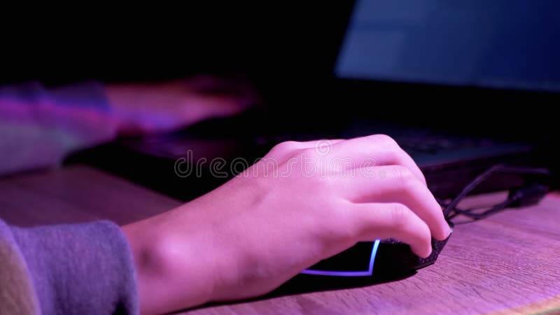 Hands of Gamer Playing Video Game at Computer in a Virtual Room at ...
