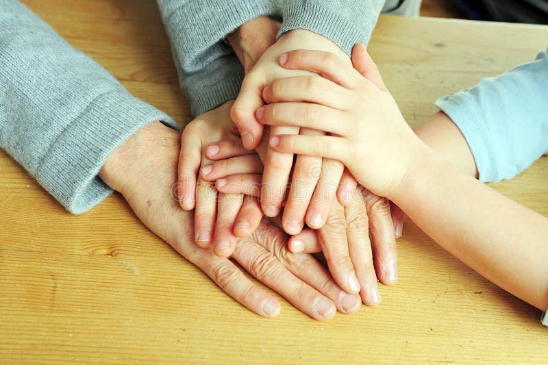 Hands of generations stock photo. Image of table, hand - 18006436