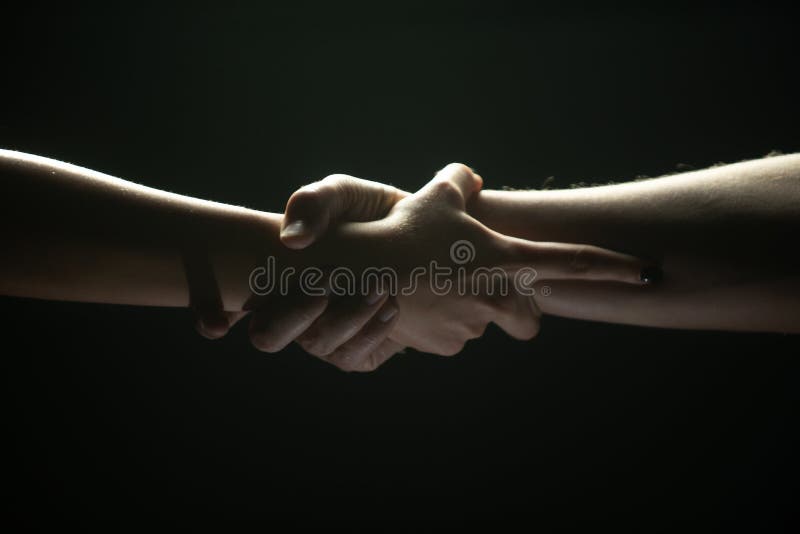 Hands Gesturing on Black Background. Giving a Helping Hand. Support and ...