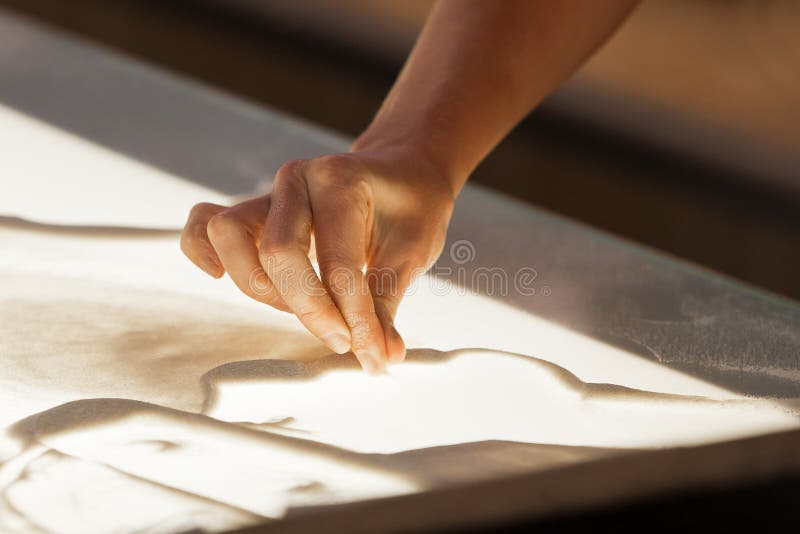 Hands girls draw sand stock image. Image of activity - 41678971