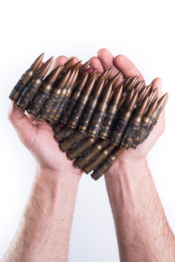 Hands of bullets stock image. Image of ammunition, copper - 24043049