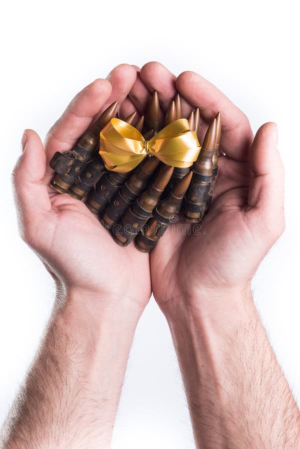 Hands of bullets stock image. Image of ammunition, copper - 24043049