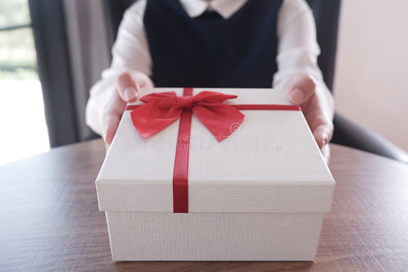 Hands Giving or Receiving a Present. Stock Image - Image of giving ...