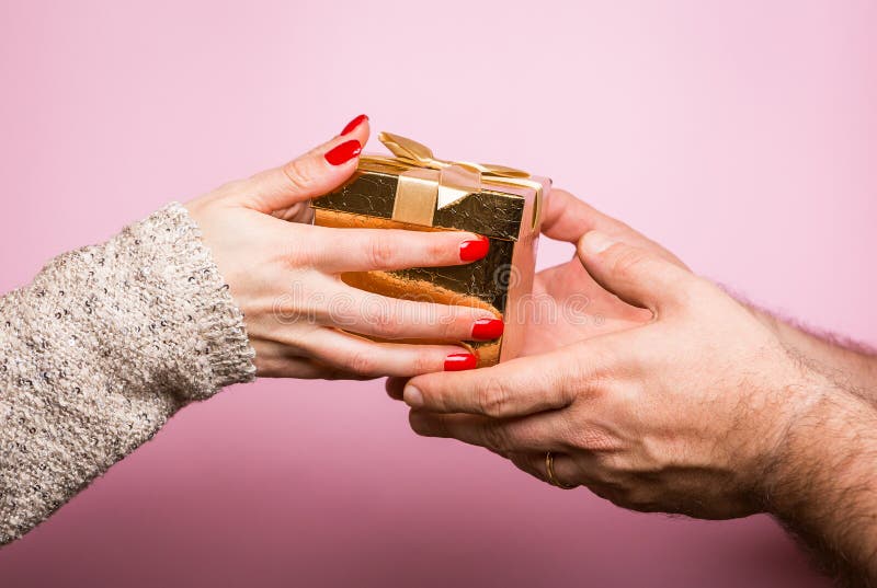 Hands Giving and Receiving a Present Stock Image - Image of holiday ...