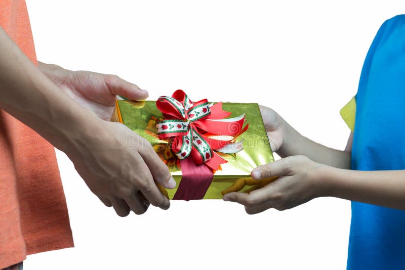 Hands Giving And Receiving A Present Stock Photo - Image: 46525581