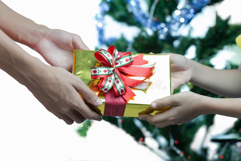 Hands Giving and Receiving a Present Stock Image - Image of surprise ...