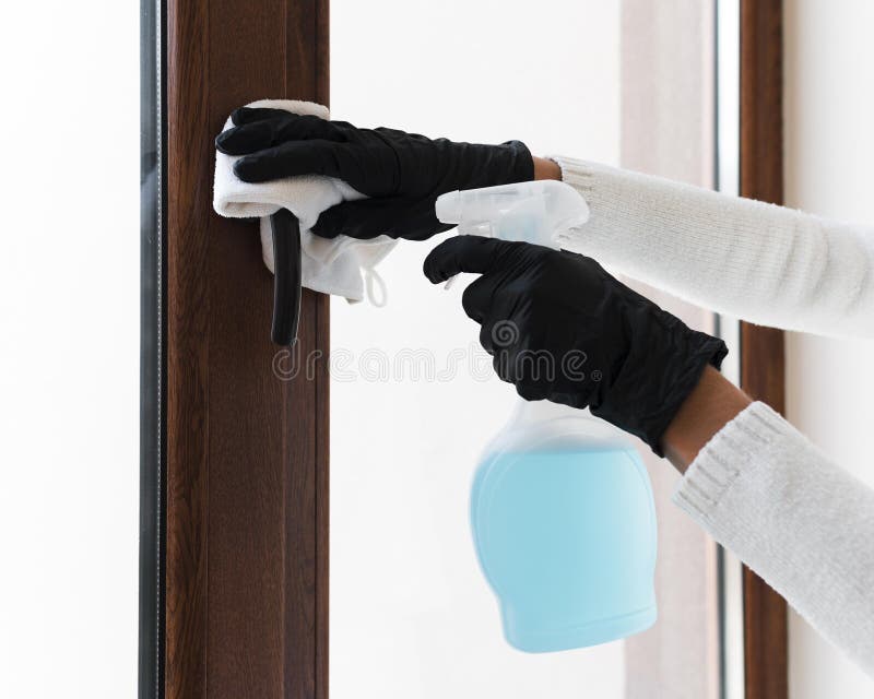 Hands with Gloves Disinfecting Window Handle. High Quality Photo Stock ...
