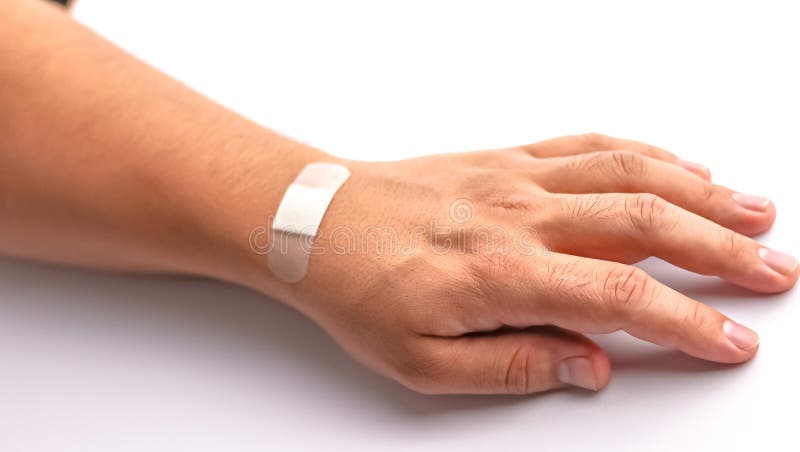 Hands glue plaster on hand stock photo. Image of hands - 247732972