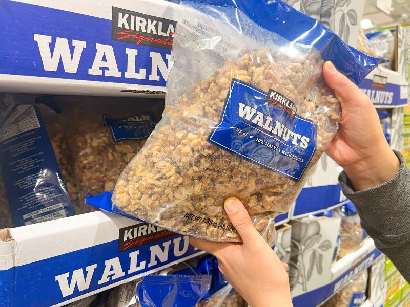 Hands Grab Kirkland Walnuts in Costco Editorial Photo - Image of brown ...