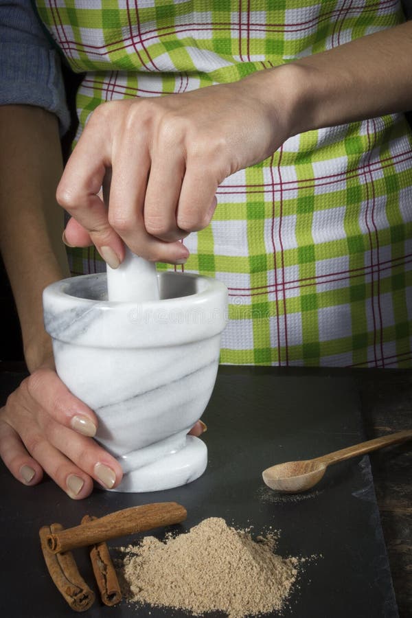 Hands Grind Cinnamon in a Mortar Stock Image - Image of spicy ...