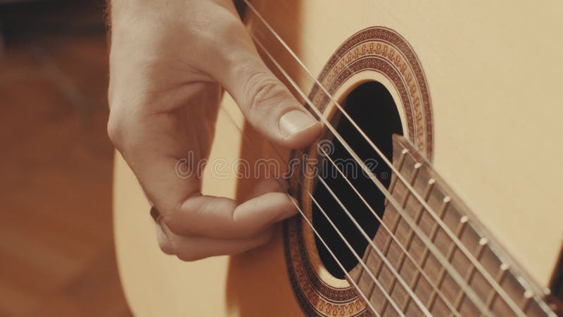 Close Up Of Musician Hand Plucking Guitar Strings Stock Footage - Video ...